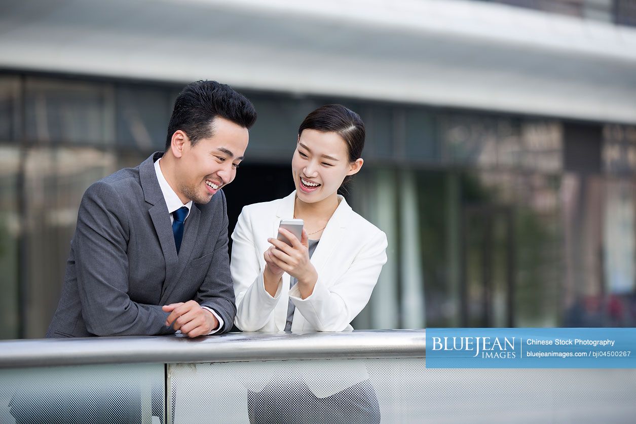 Chinese business person using smart phone-High-res stock photo for download