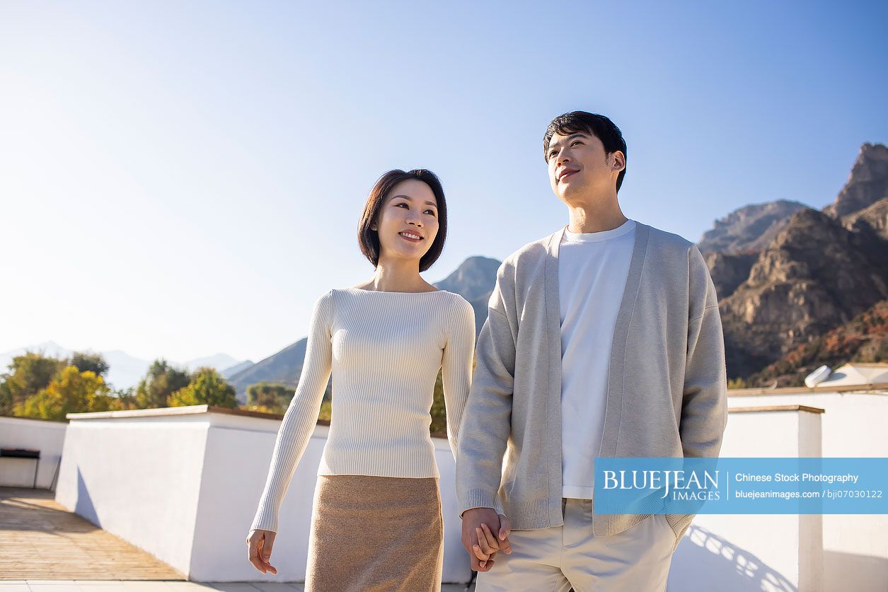 Happy young Chinese couple on vacation-High-res stock photo for download