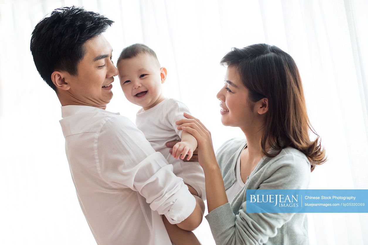 Happy young Chinese family-High-res stock photo for download