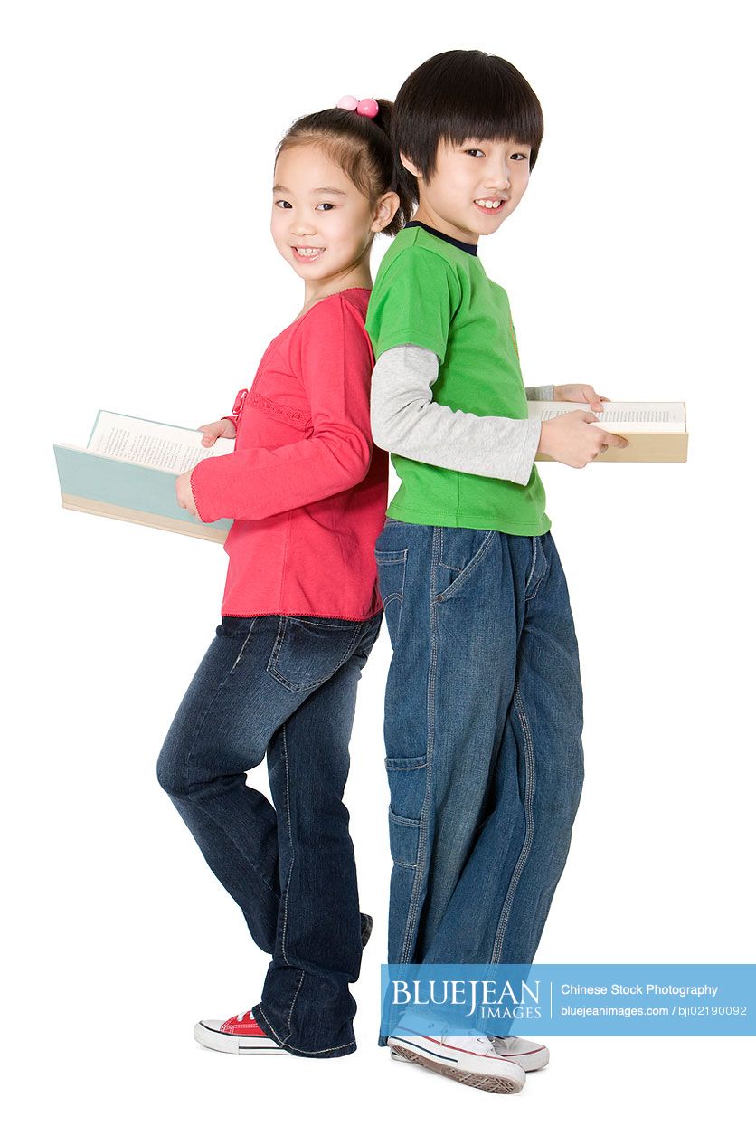 Two Chinese students reading back to back-High-res stock photo for download