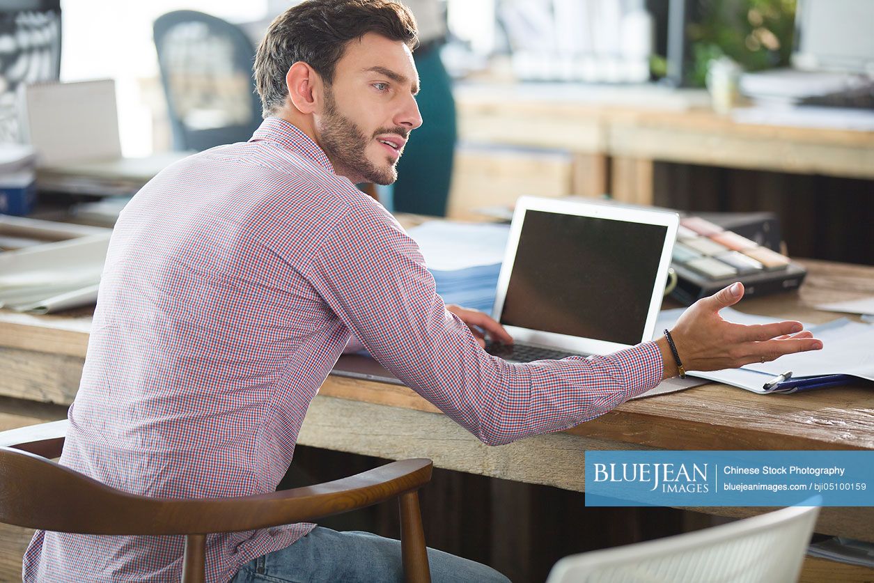 Male architect talking in the office-High-res stock photo for download