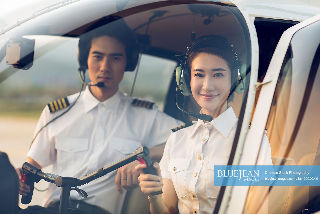 Chinese pilots sitting in helicopter cockpit-High-res stock photo for ...