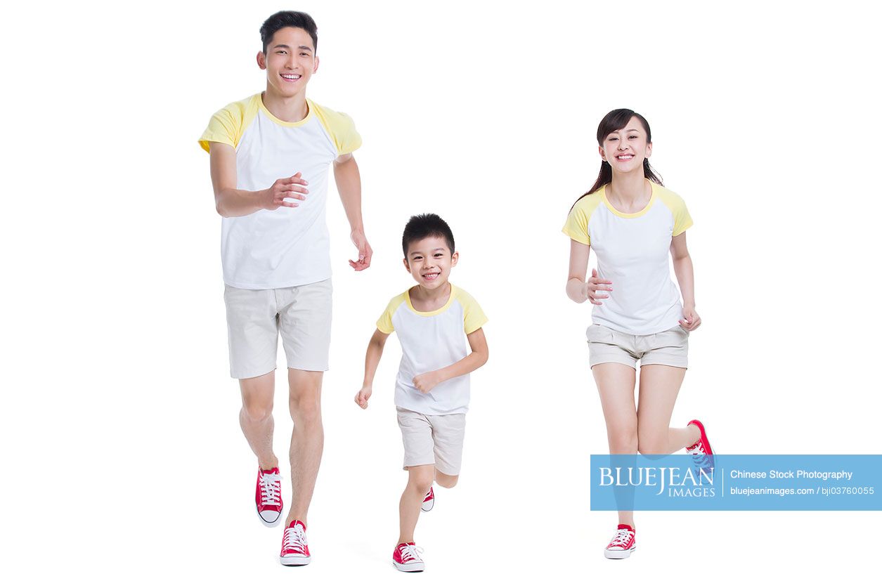 Happy young Chinese family running-High-res stock photo for download