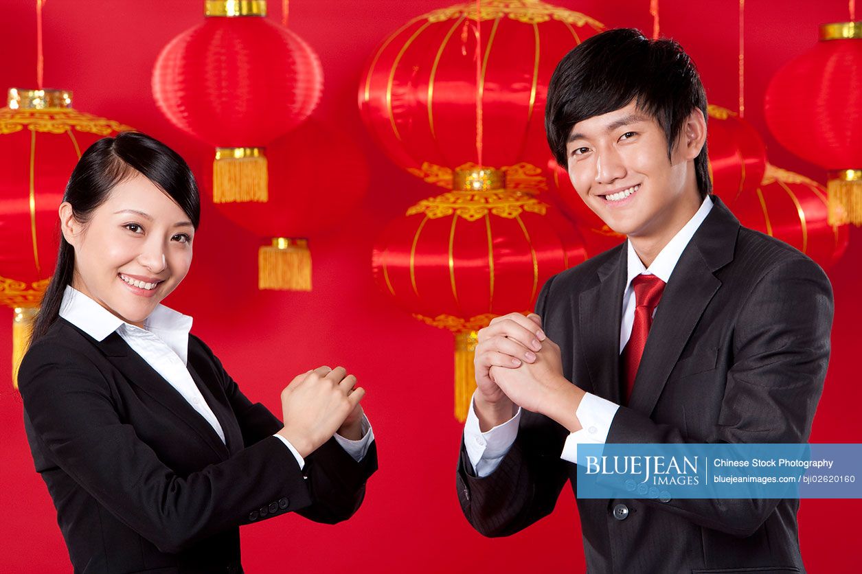 Chinese business team offering congratulations-High-res stock photo for ...
