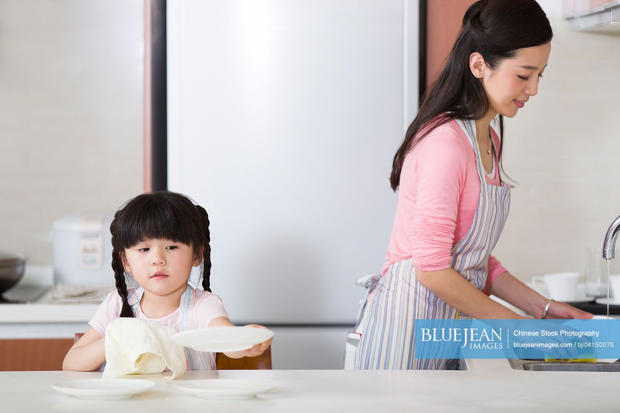 Chinese mother and daughter washing dishes-High-res stock photo for ...