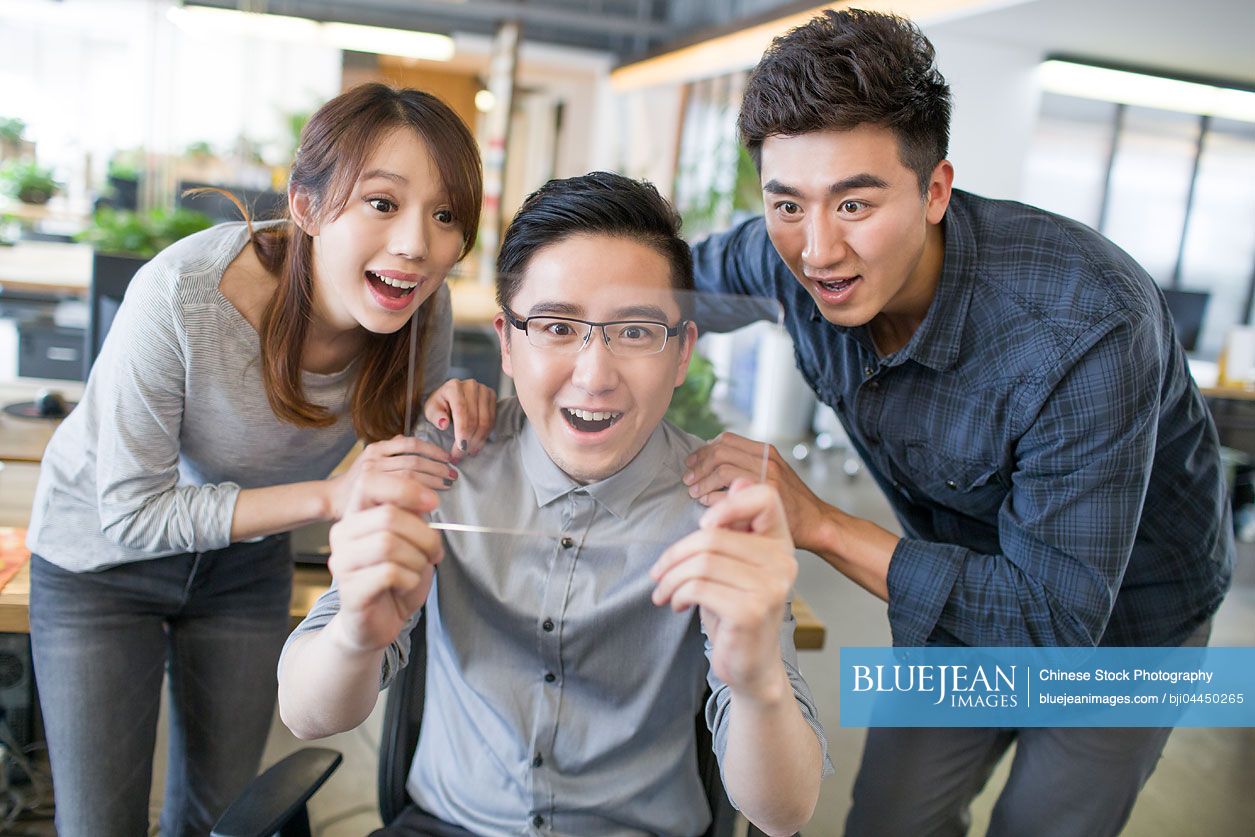 Chinese IT workers developing digital tablet-High-res stock photo for ...