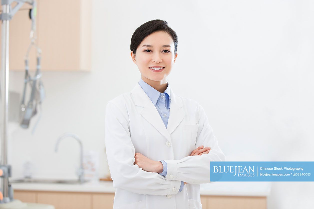 Confident female Chinese doctor with arms crossed-High-res stock photo ...