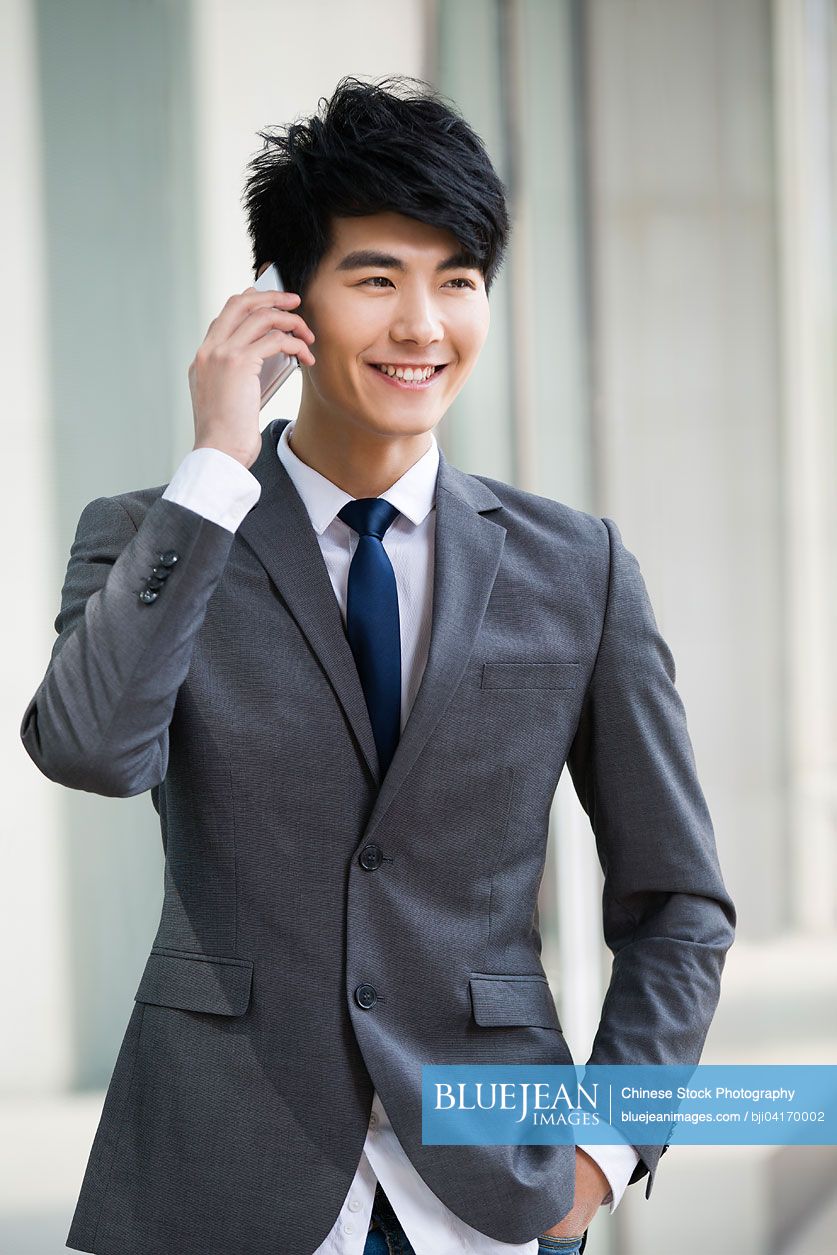 Young Chinese businessman on the phone-High-res stock photo for download