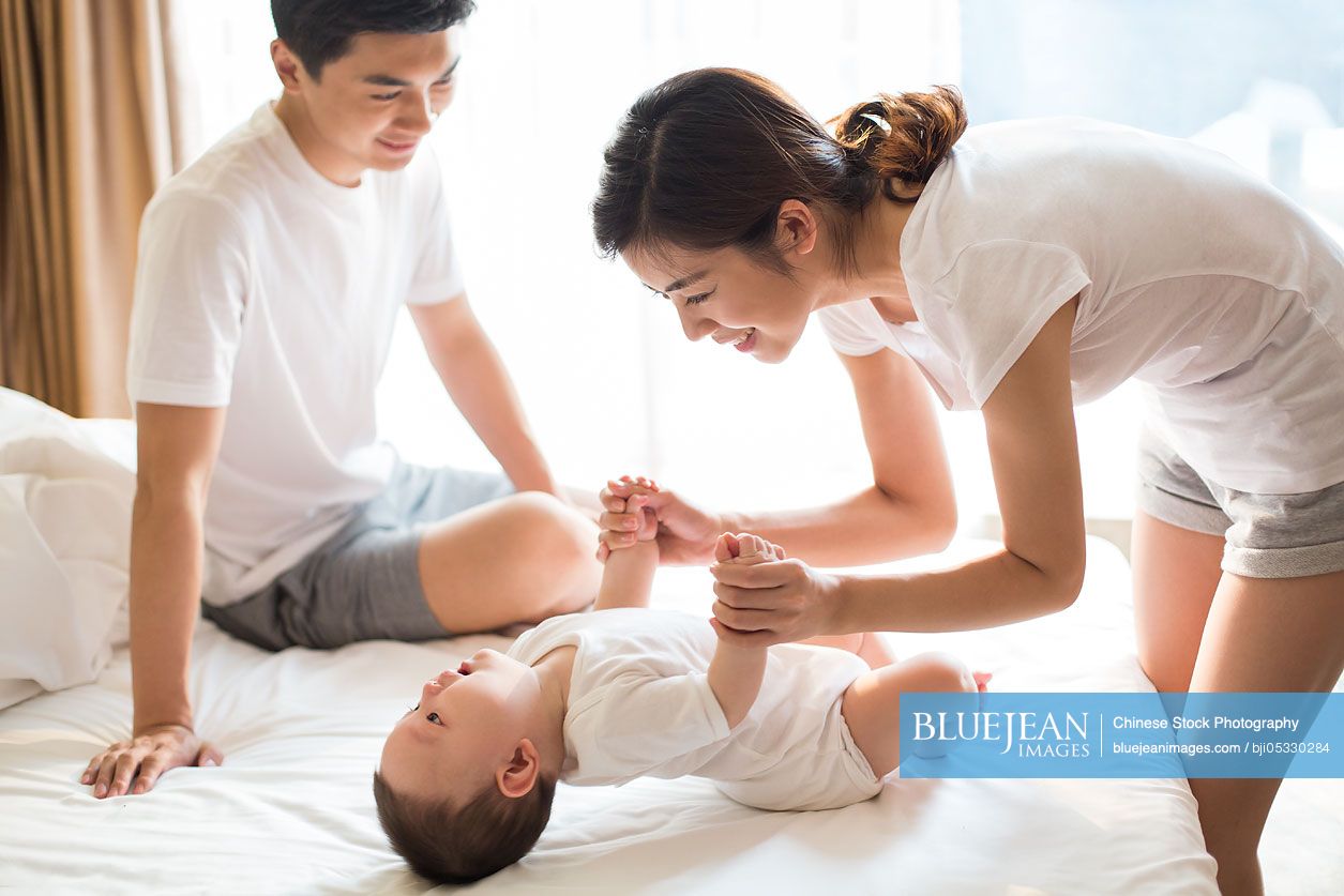 Happy young Chinese family-High-res stock photo for download