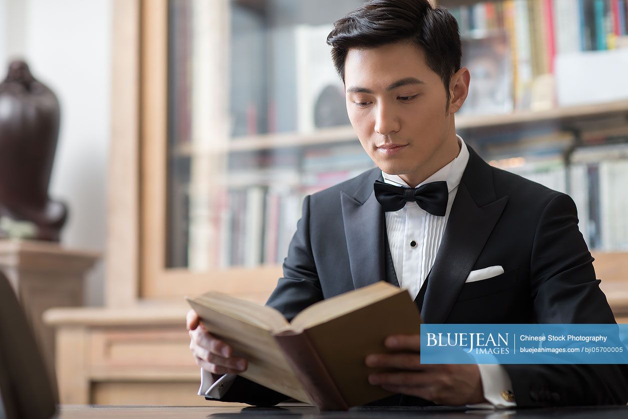 Young Chinese nobleman reading in the study-High-res stock photo for ...