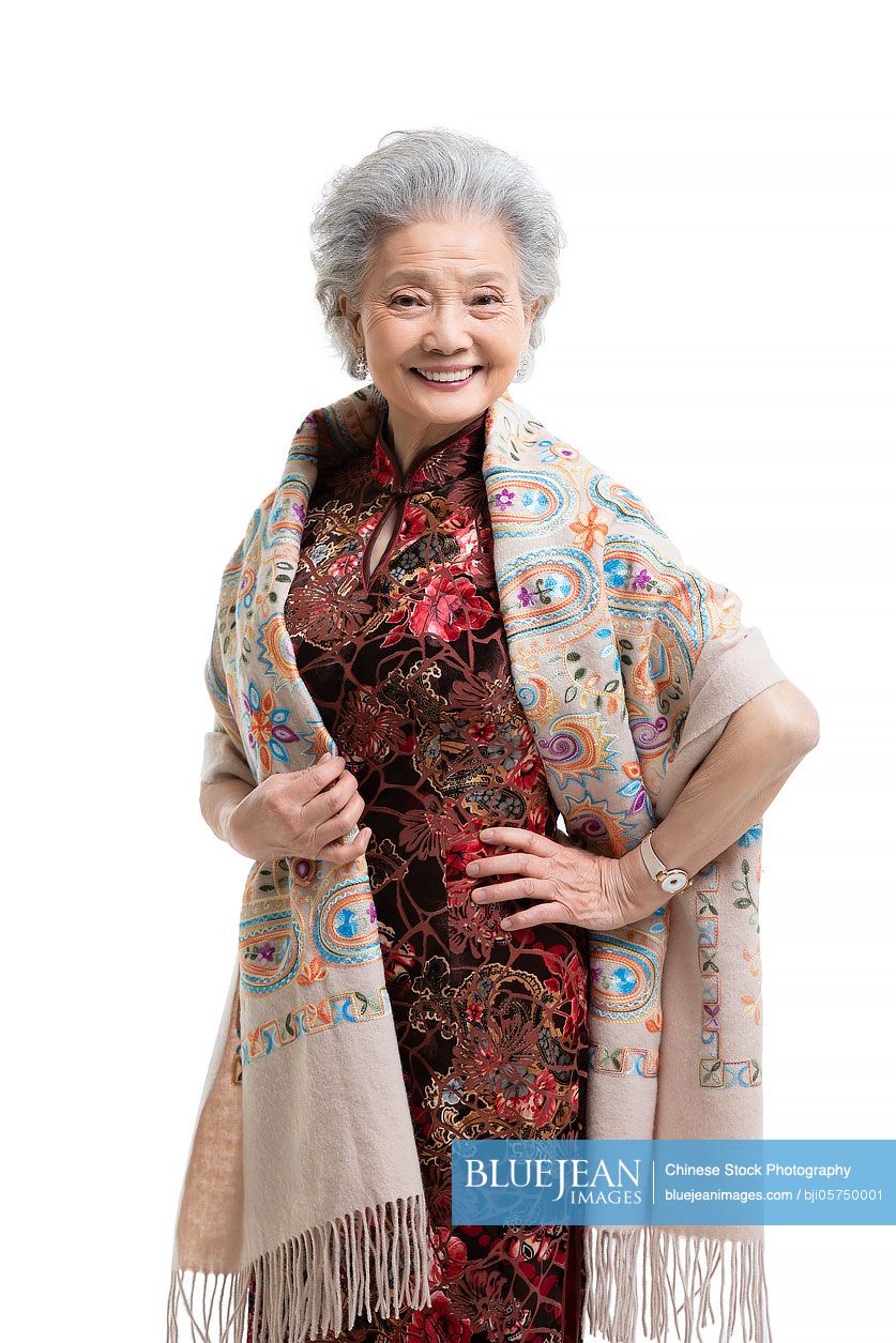 Portrait of happy senior Chinese woman in qipao-High-res stock photo ...