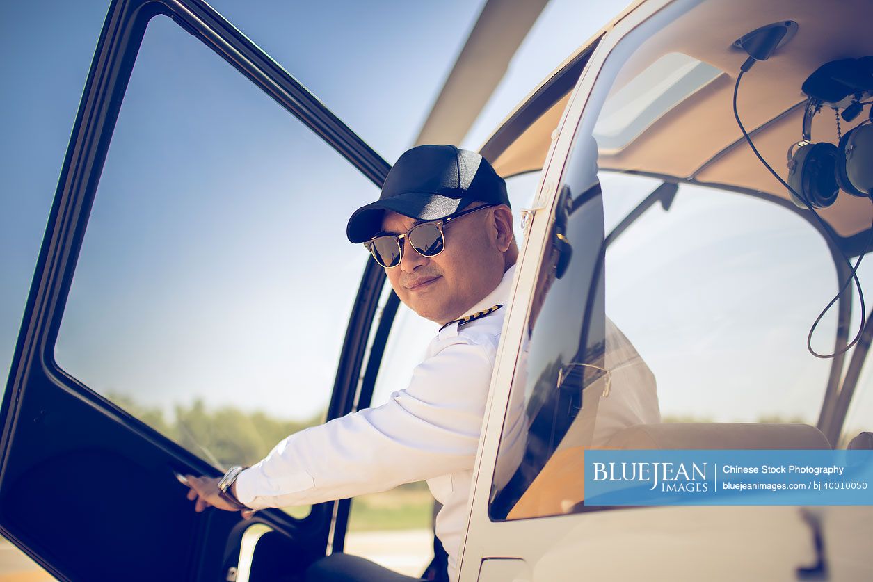 Chinese pilot sitting in helicopter cockpit-High-res stock photo for ...