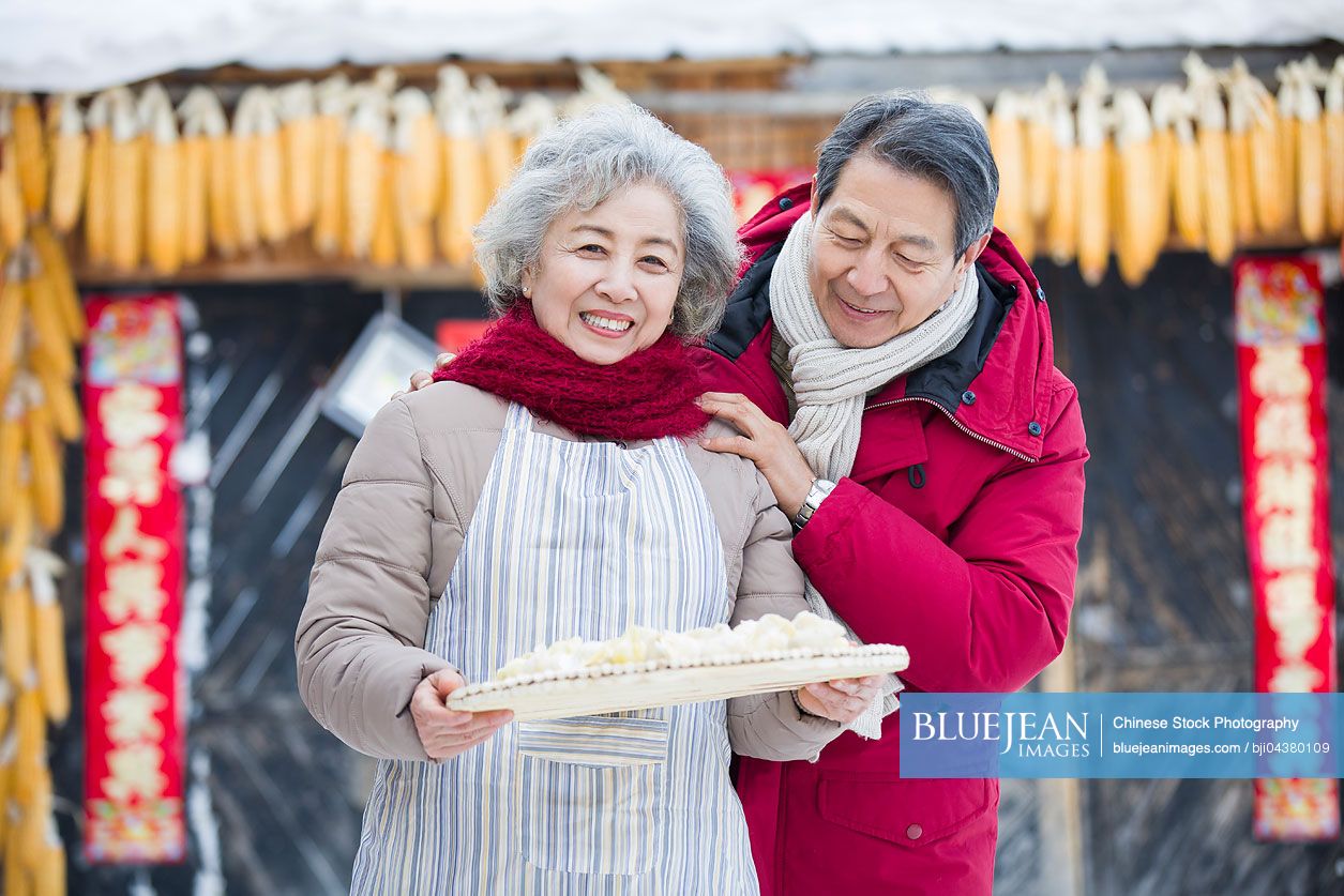 Senior couple with Chinese Dumplings-High-res stock photo for download