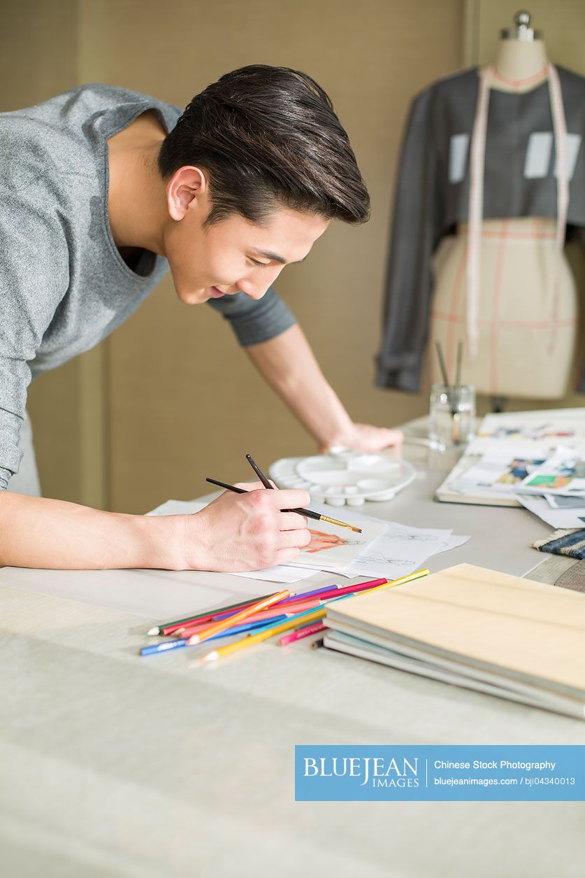 Chinese fashion designer drawing sketch-High-res stock photo for download