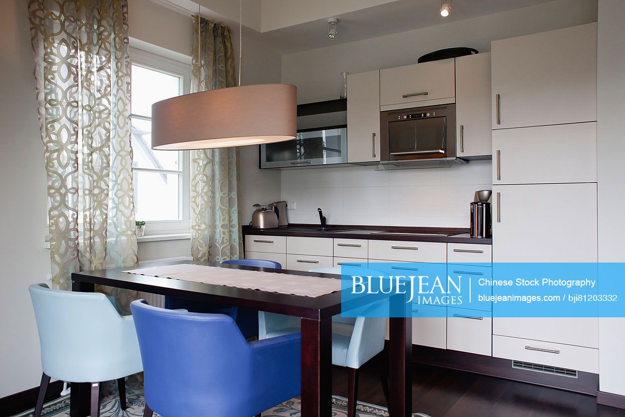 Kitchen and dining area in contemporary house-High-res stock photo for ...