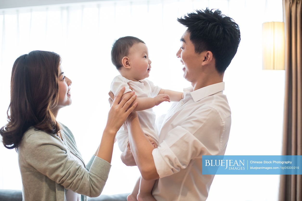 Happy young Chinese family-High-res stock photo for download