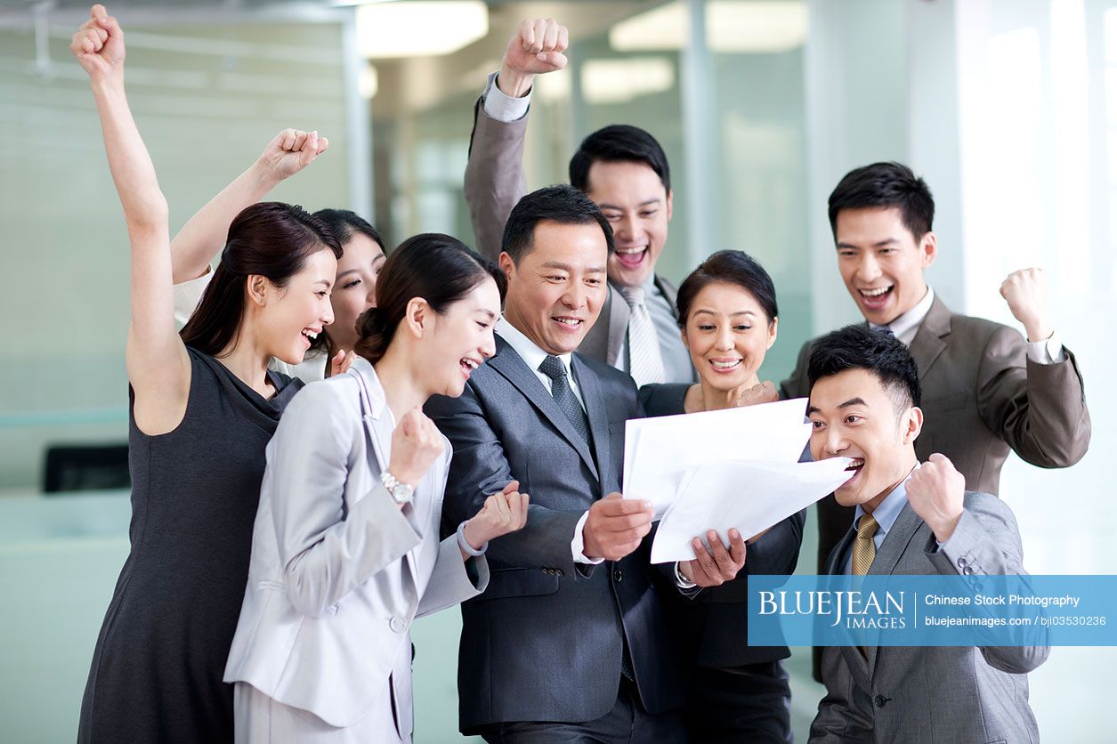 Chinese business team celebrating with excitement-High-res stock photo ...